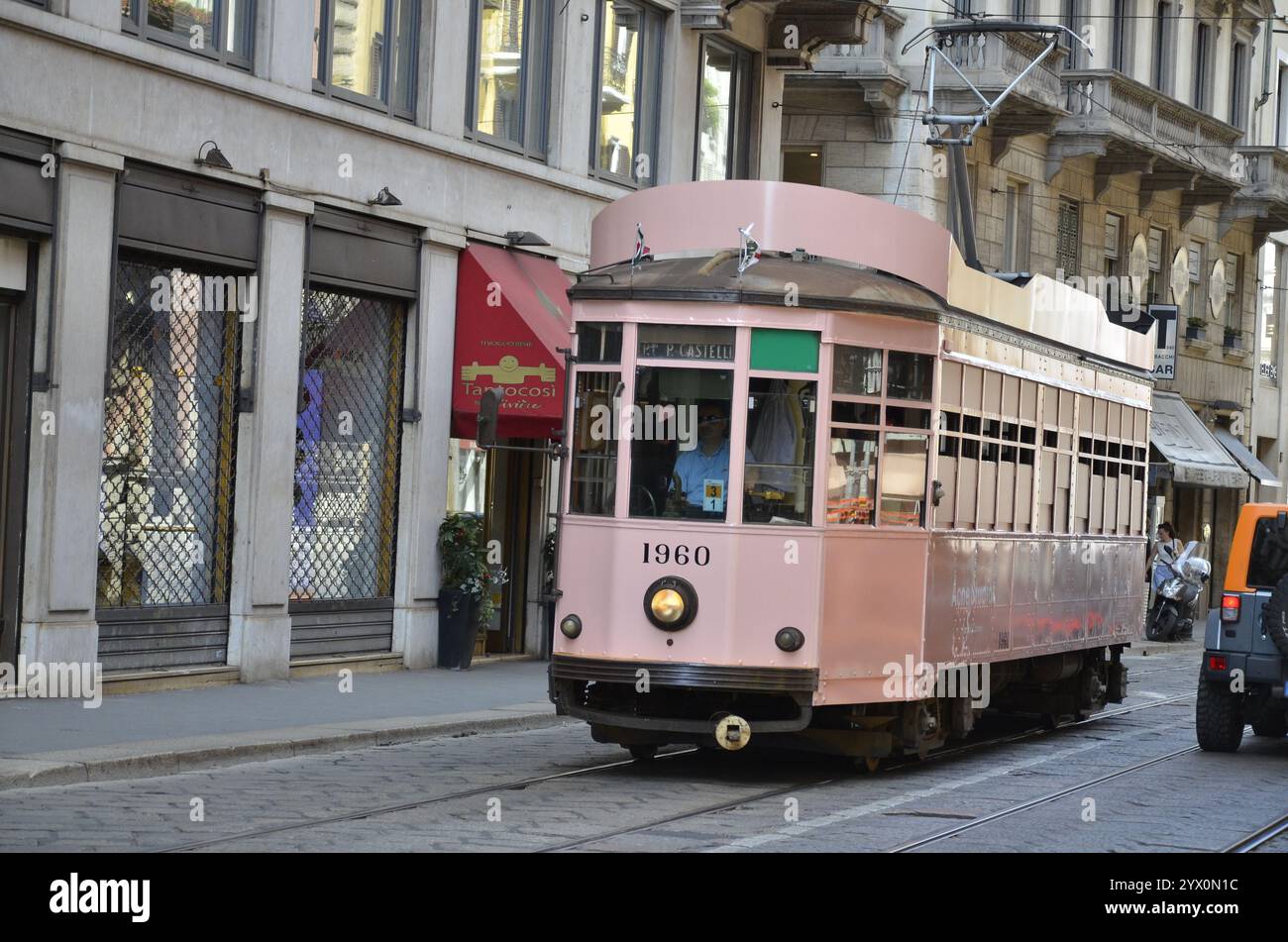 Pink Tramway in downtown Milano, Italy Stock Photo - Alamy