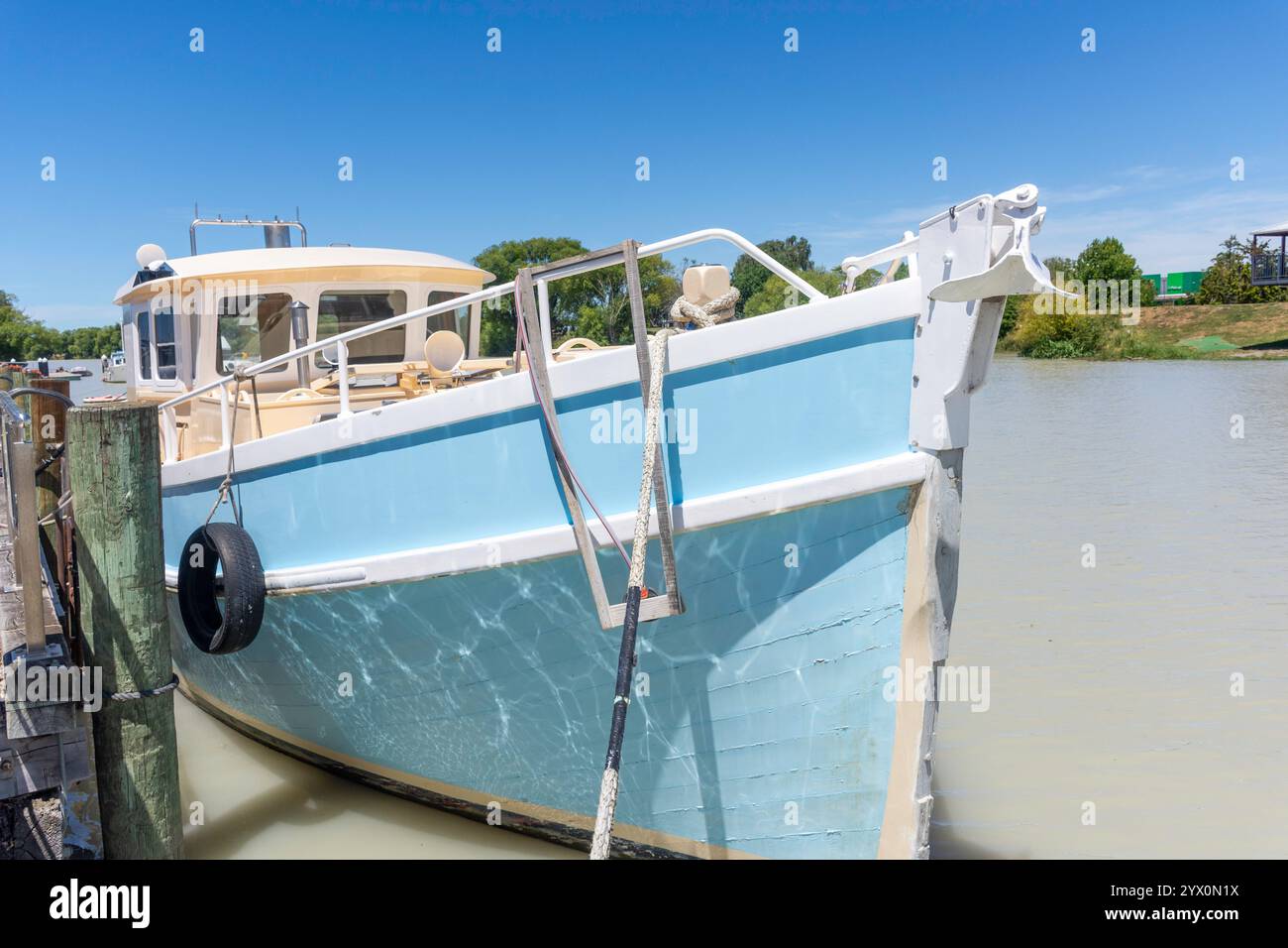 Wooden fishing boat cabin cruiser ketch moored on kaiapoi river hi-res ...