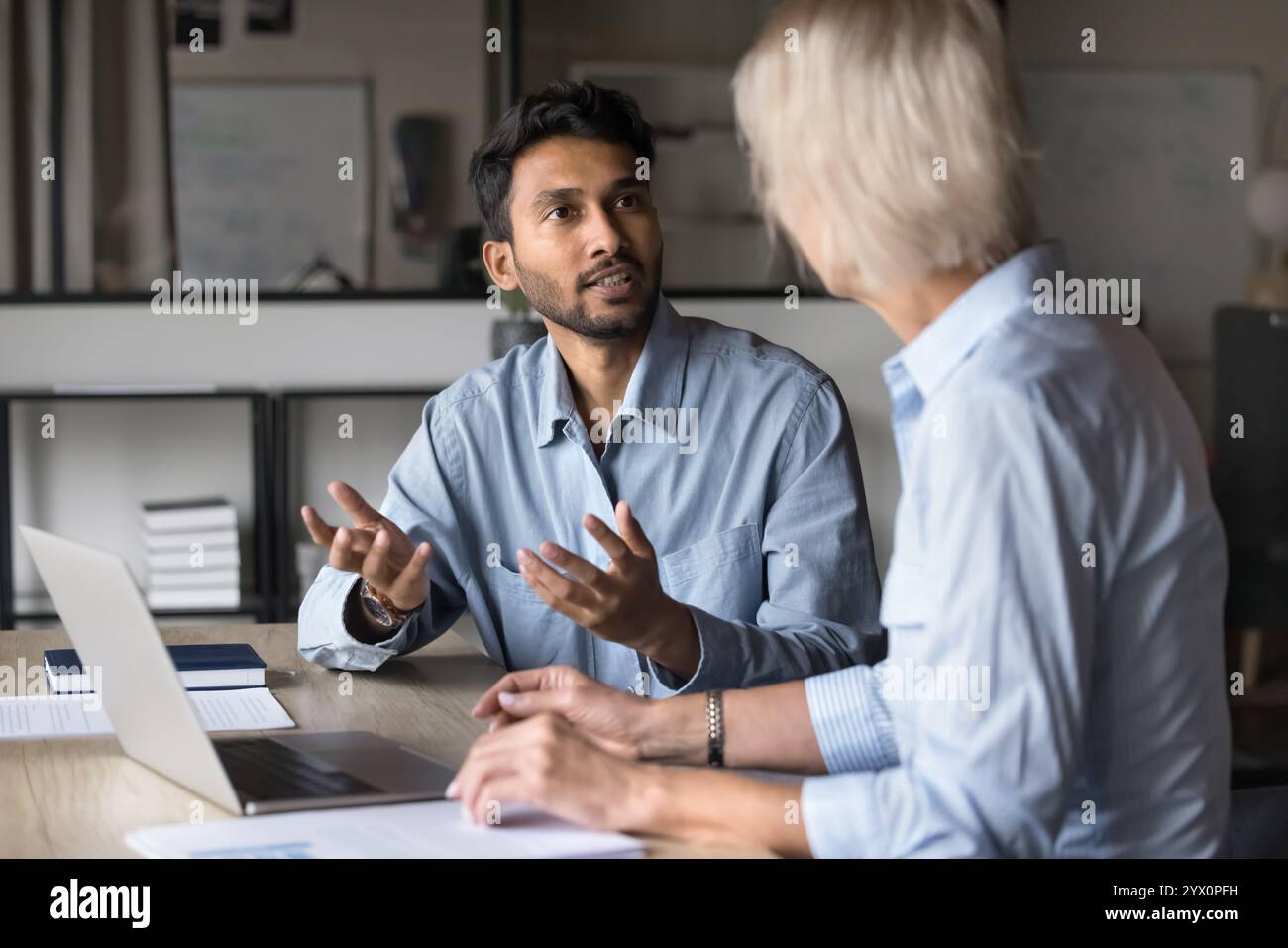 Indian agent or broker sell company services to female client Stock ...