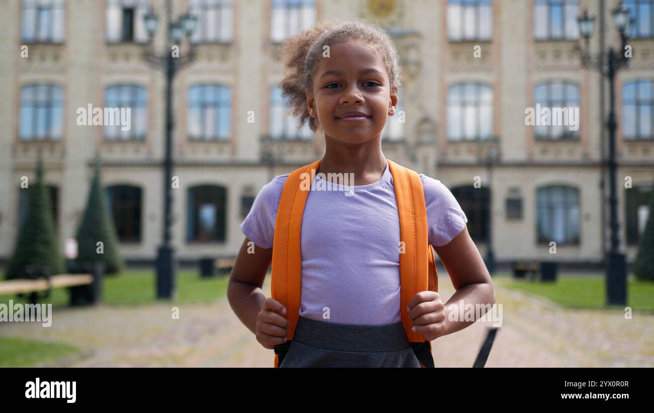 Elementary education happy little girl African American kid daughter ...
