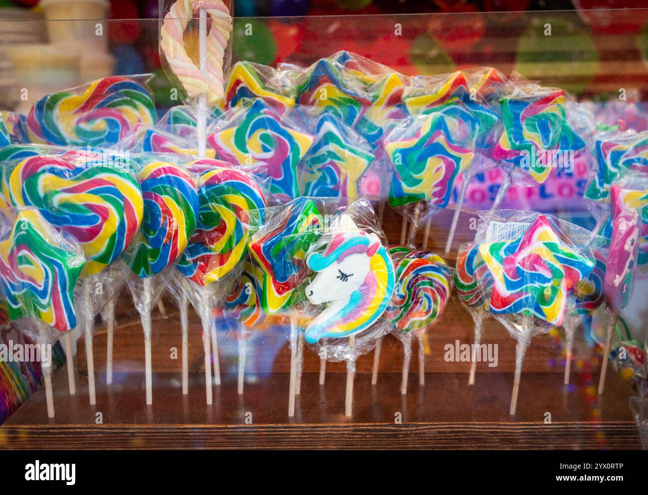 Close up of big colourful heart, star and unicorn lollipops at British ...