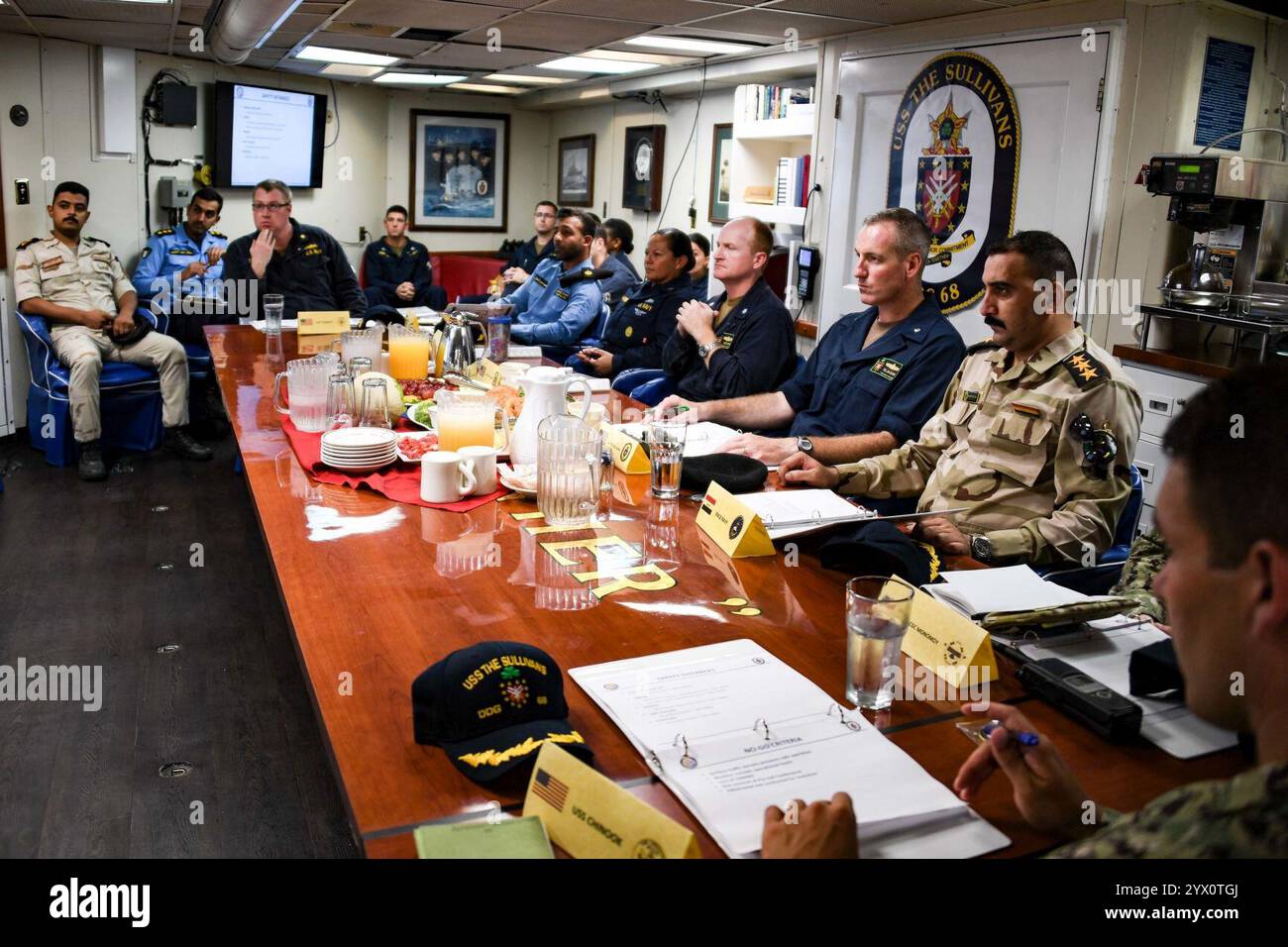 Conference in the wardroom of the guided-missile destroyer USS The Sullivans (DDG 68 Stock Photo ...