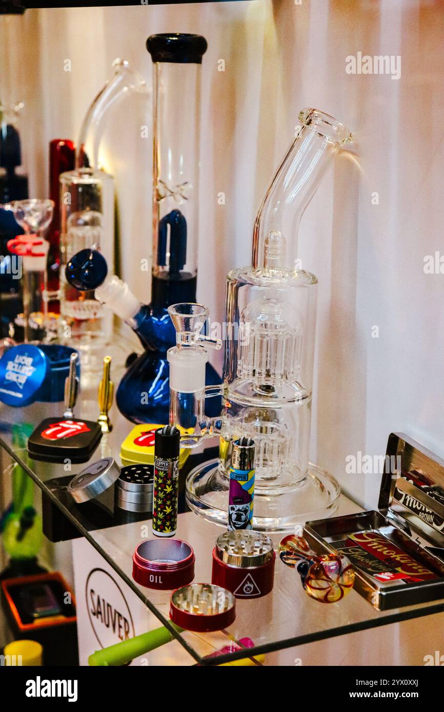 Glass shelf with display of pipes and various drug smoking items Stock ...