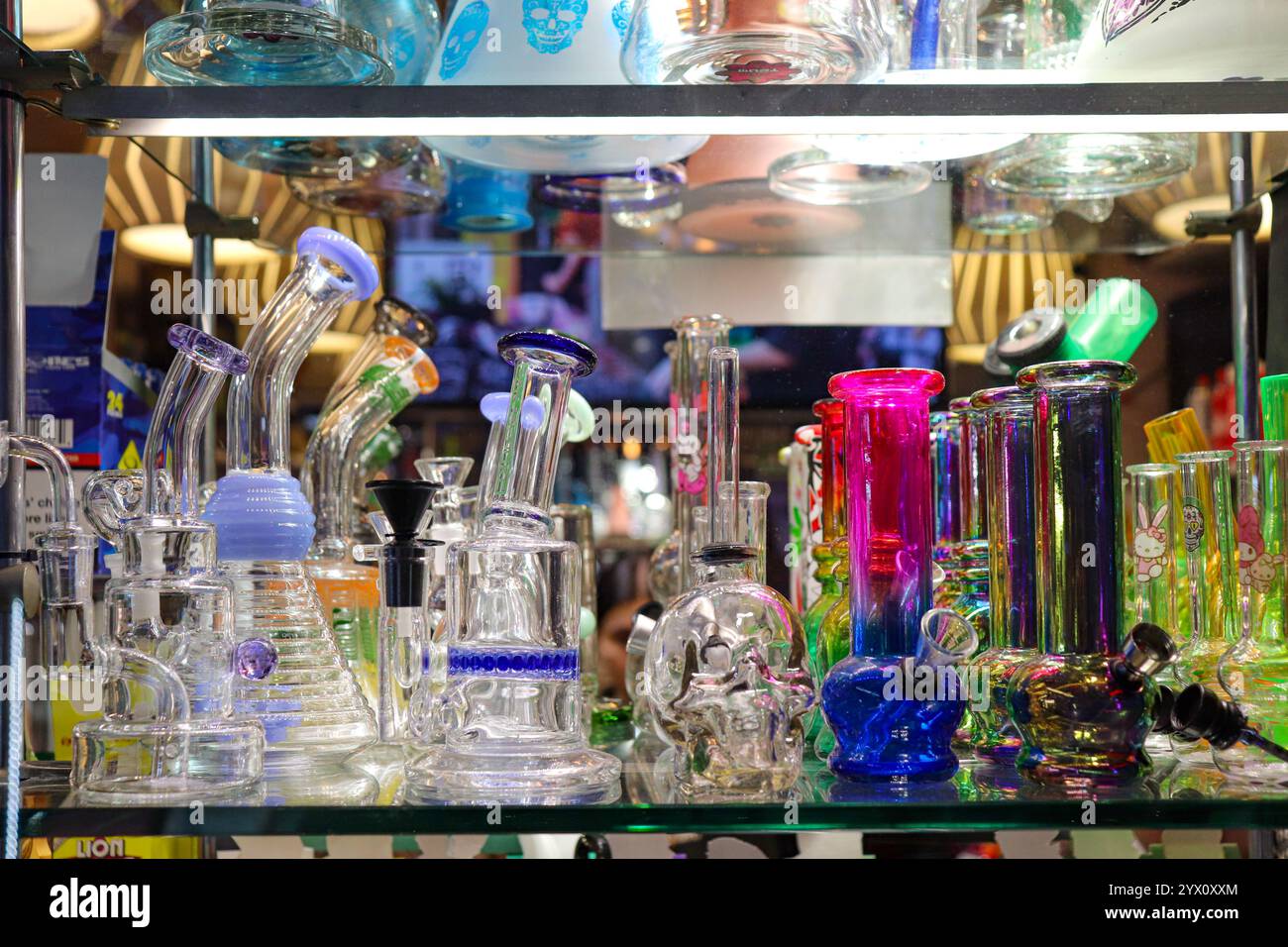 display case with paraphernalia for cannabis consumption with water ...