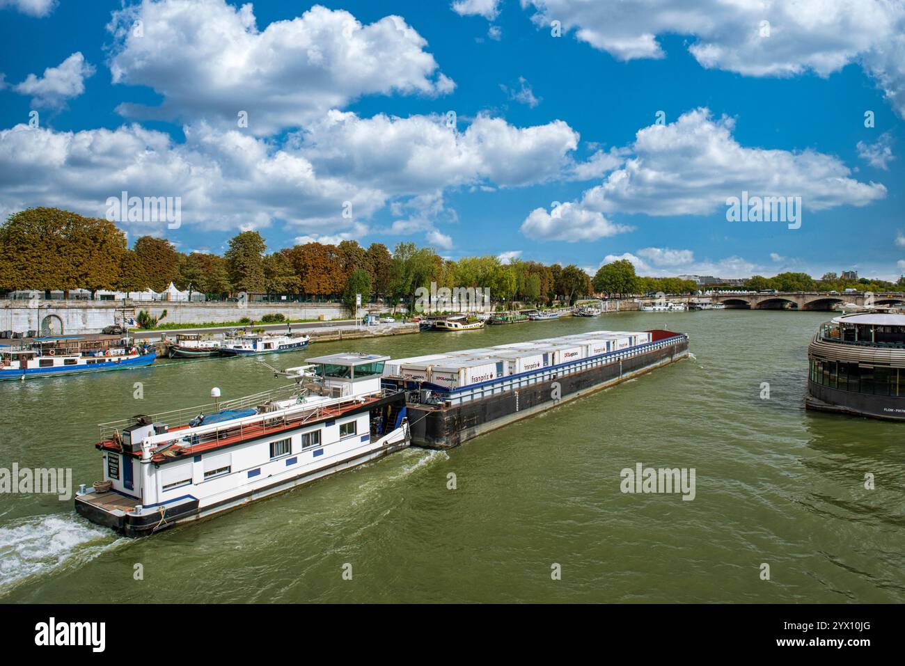 Boats of all kinds passing under the bridges of Paris, France Stock ...