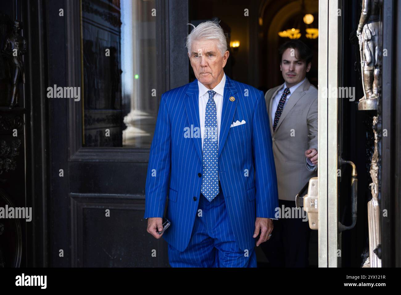 Rep. Roger Williams (R-Texas) departs the U.S. Capitol Dec. 12, 2024 ...