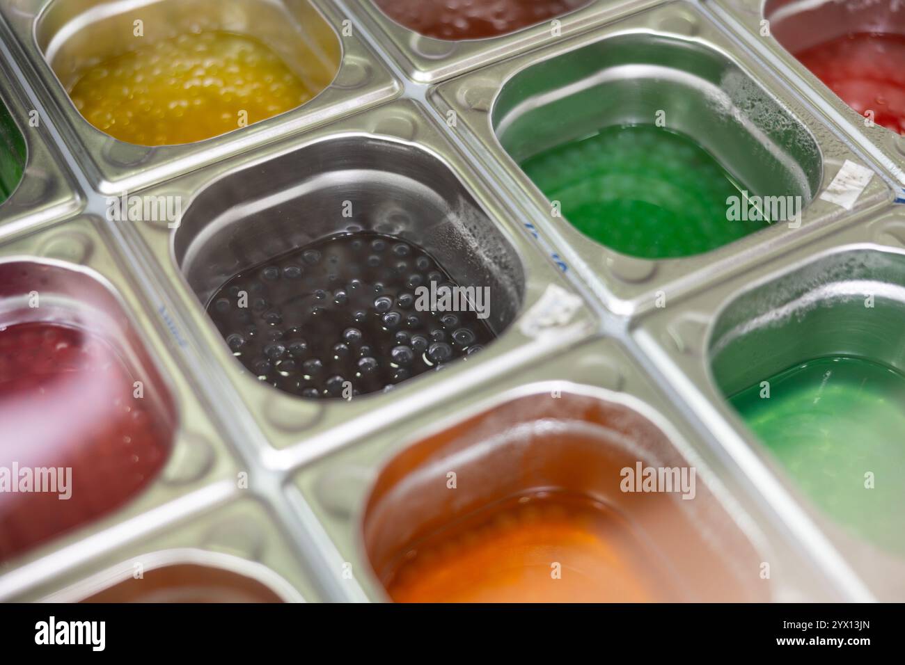 Containers with colorful jelly and juice balls for bubble tea Stock ...