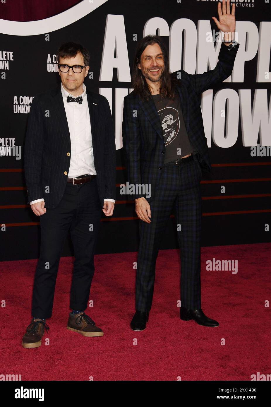 HOLLYWOOD, CALIFORNIA - DECEMBER 10: Rivers Cuomo of Weezer, Brian Bell ...