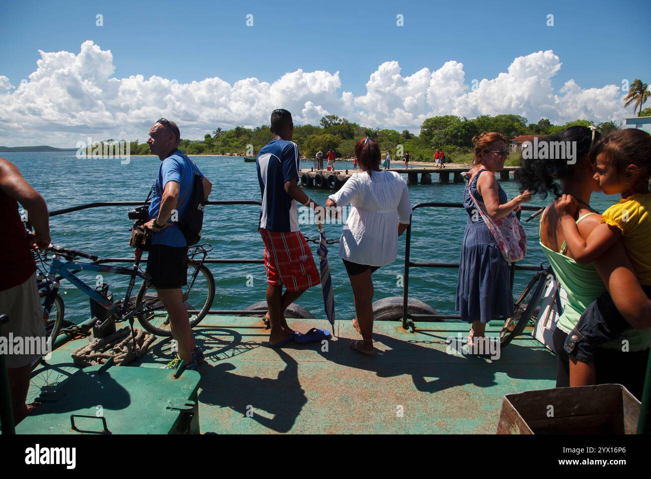 Group of Cuban people at the transport boat leaving Jagua village ...