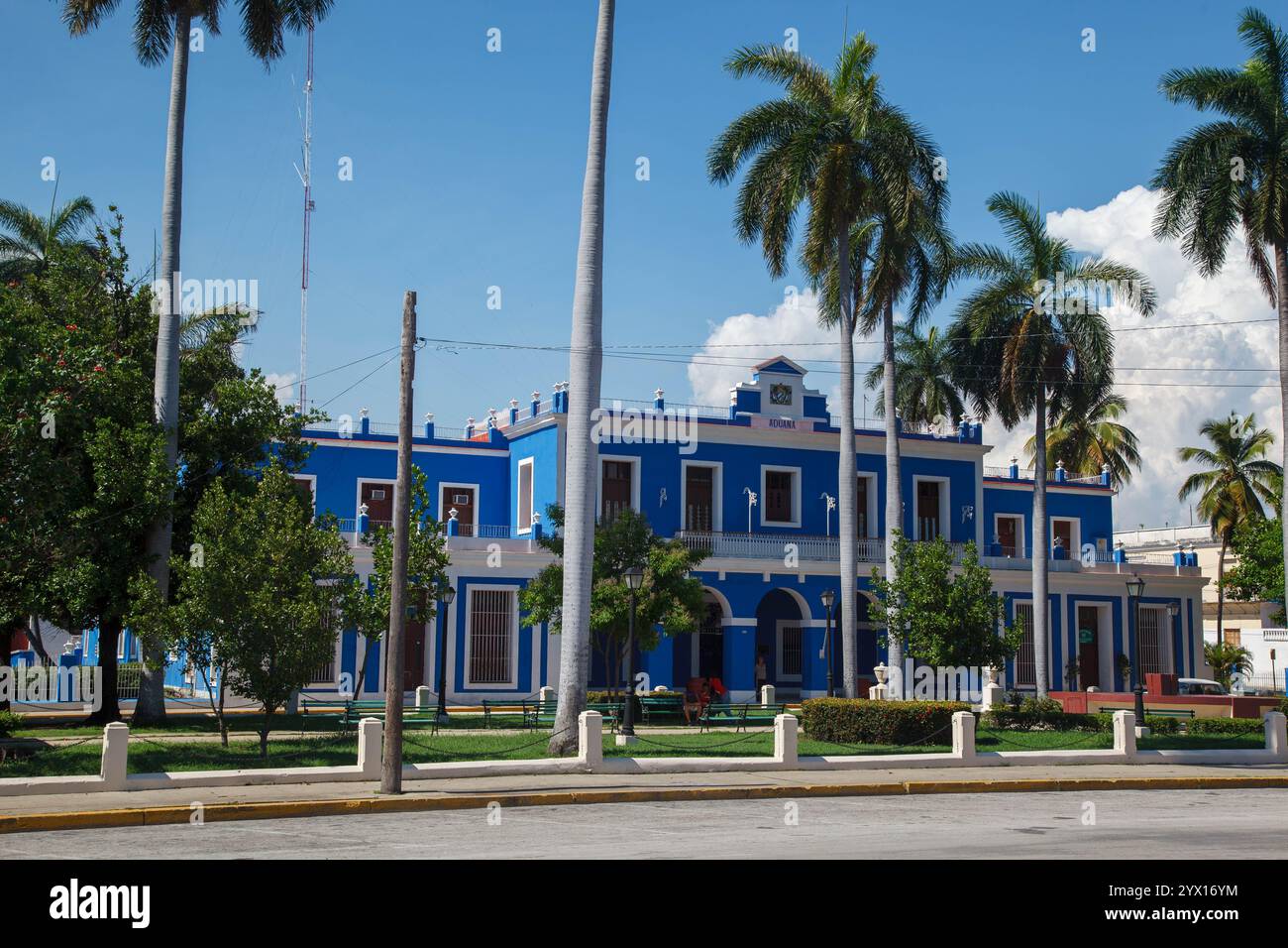 The facade of the old Aduana historical building and palm trees in ...