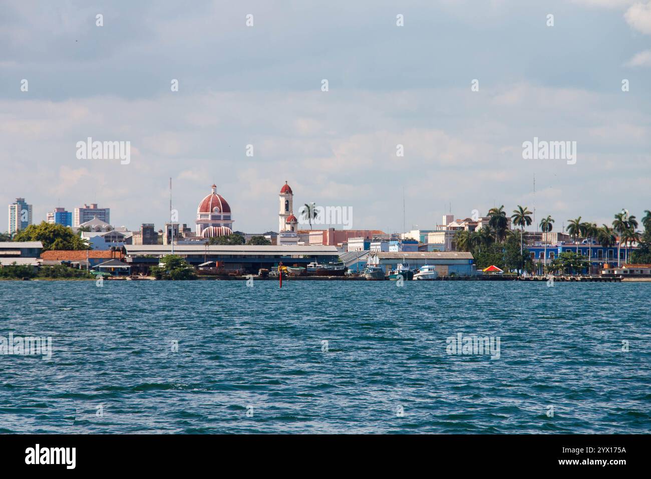 The Palacio de Gobierno dome, the cathedral tower and the buildings of ...