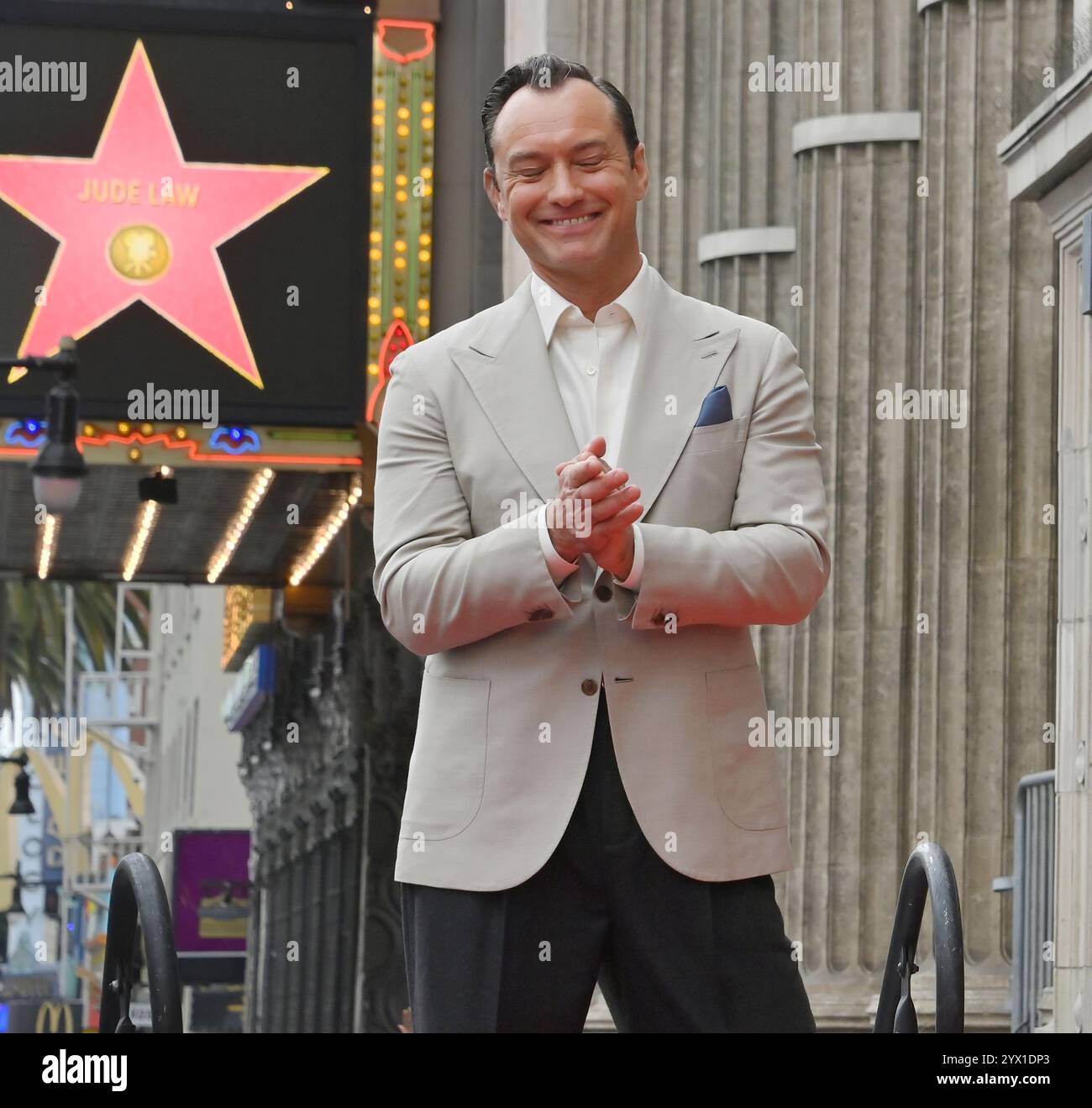 Los Angeles, United States. 12th Dec, 2024. Actor Jude Law savors the ...