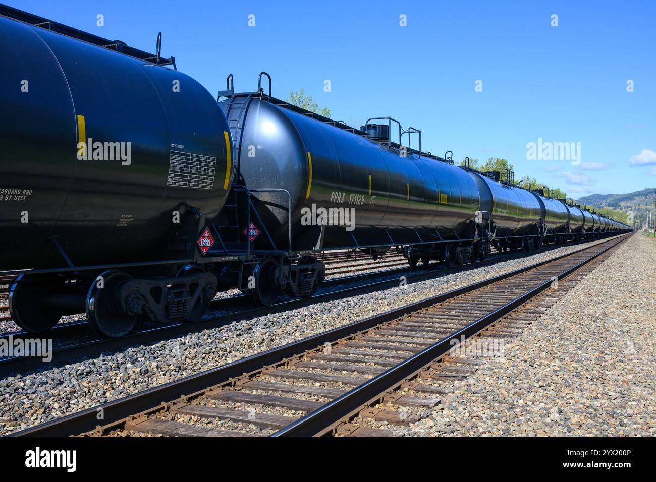 Gold Bar, WA, USA - April 17, 2024; Train tanker line with hazmat ...