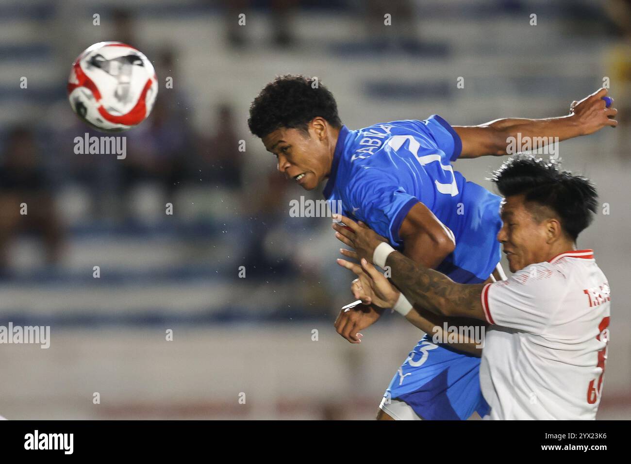 Manila, Philippines. 12th Dec, 2024. Thet Hein Soe (R) of Myanmar vies with Paul Bismarck ...