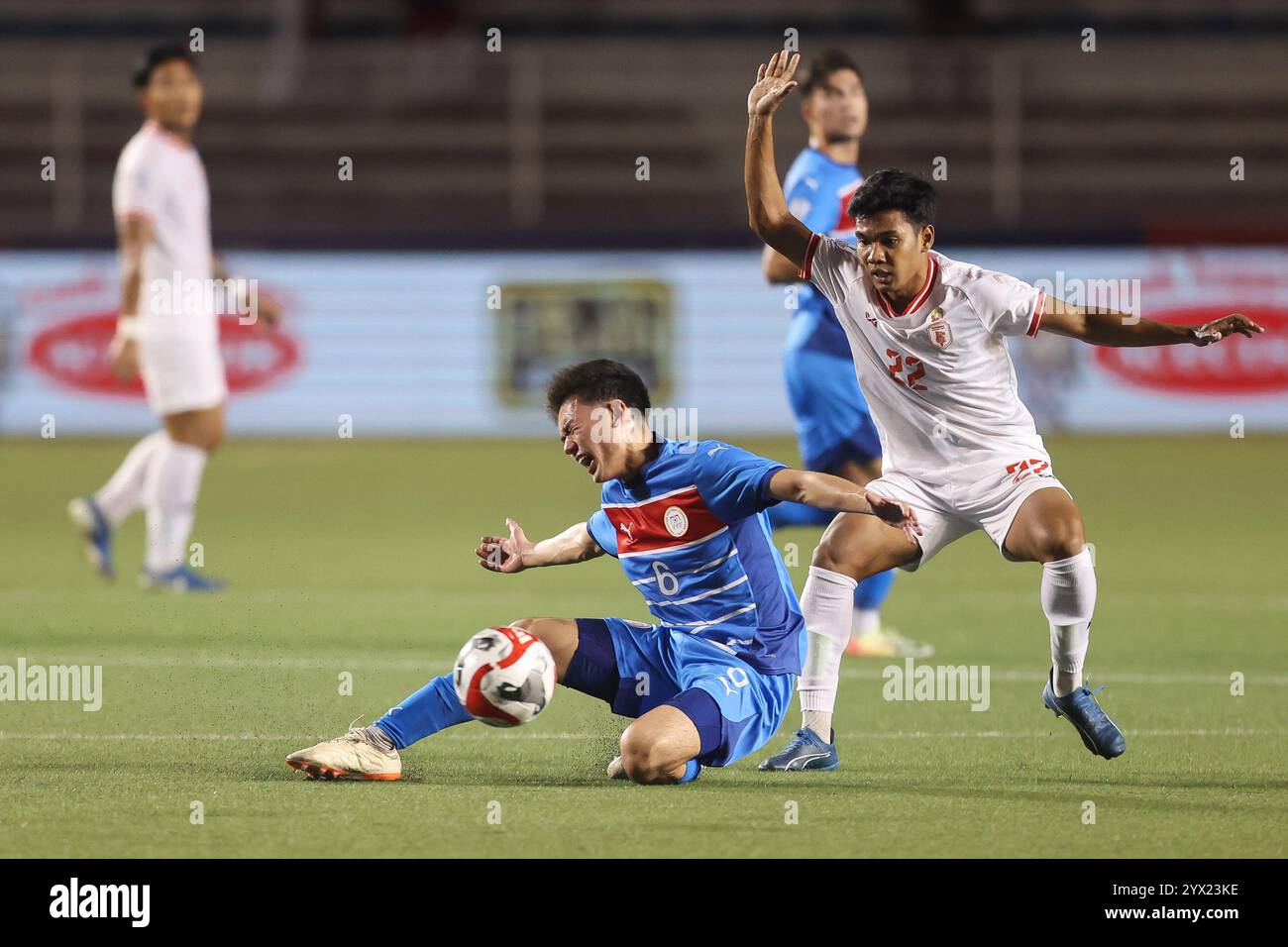 Manila, Philippines. 12th Dec, 2024. Sandro Miguel Sison Reyes (front, L) of the Philippines ...