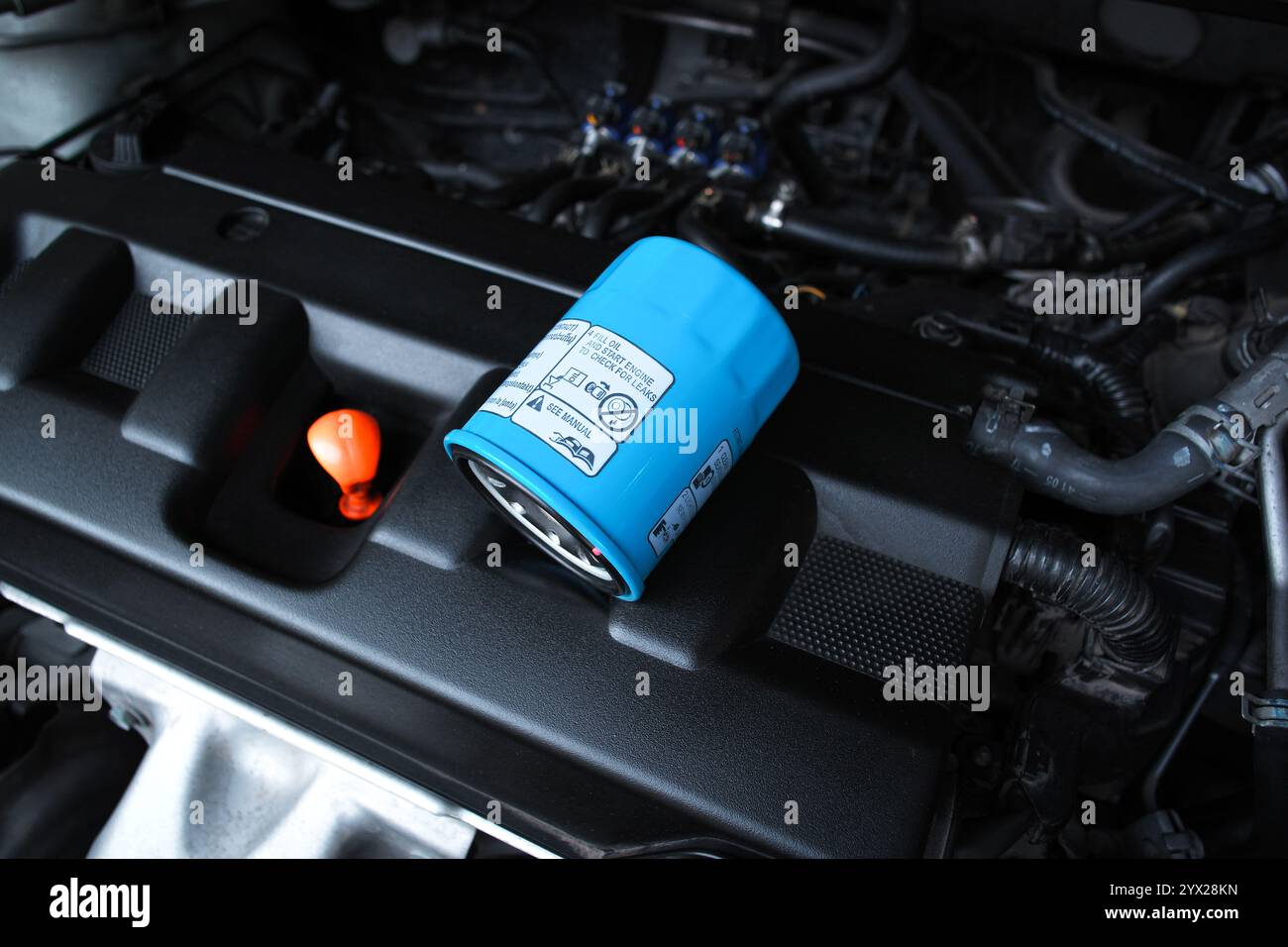 Oil filter in automotive engine compartment , Automotive parts concept ...
