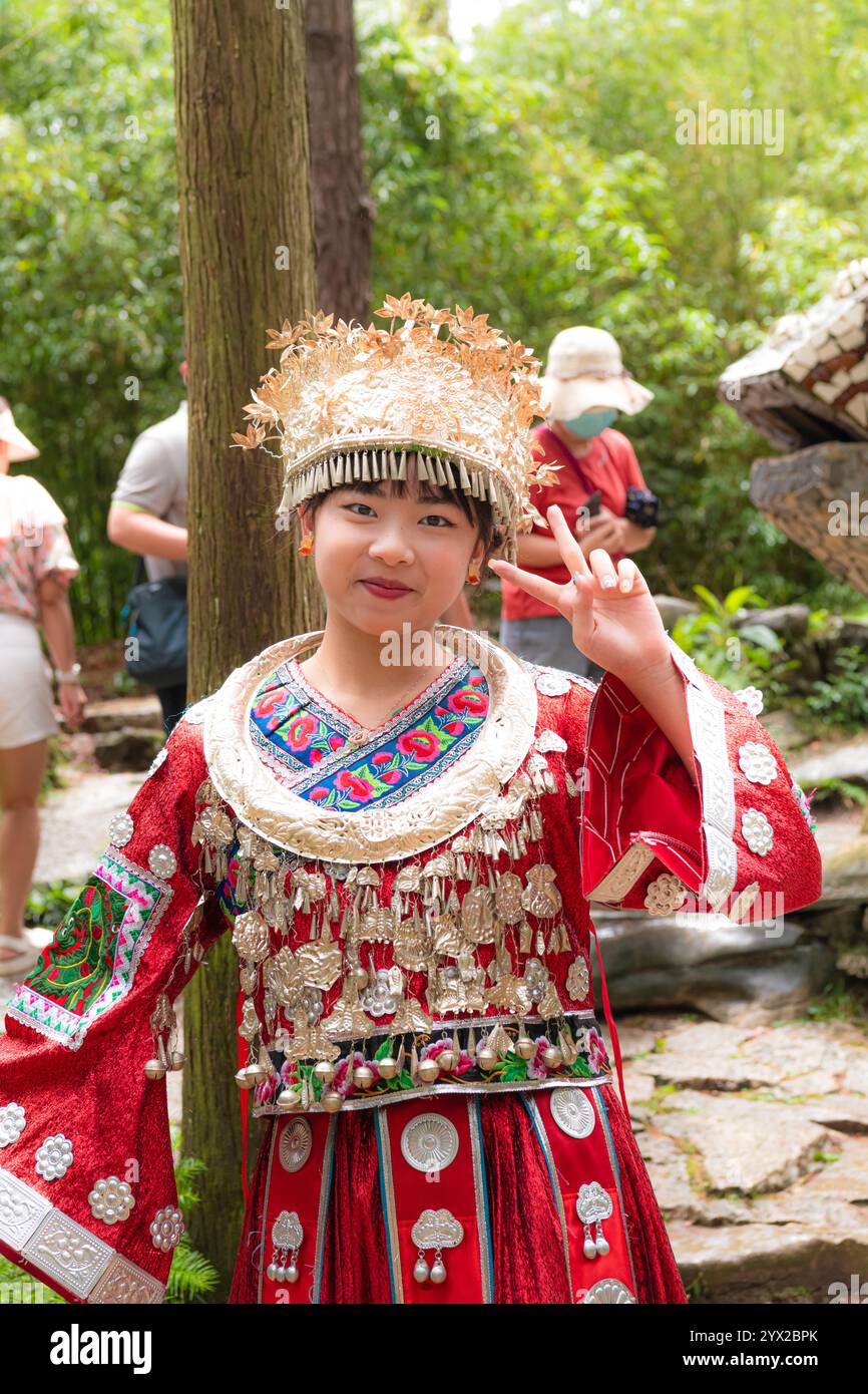 GUIZHOU, GUIYANG, CHINA, 16 AUGUST, 2022: A girl wearing traditional ...