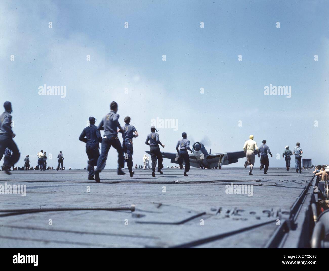 Curtiss SB2C-1 Helldiver of VB-5 land aboard USS Yorktown (CV-10) with ...