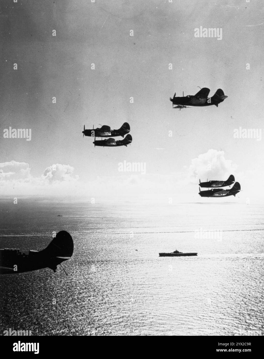 Curtiss SB2C-1 Helldivers of VB-1 return to USS Yorktown (CV-10), in ...