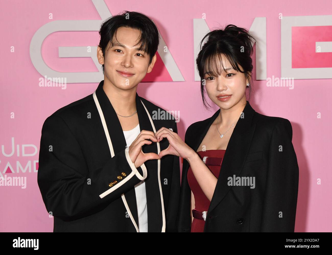 LOS ANGELES, CA - DECEMBER 12: Yim Si-wan and Jo Yu-ri AT THE Netflix Squid Game S2 LA Premiere ...