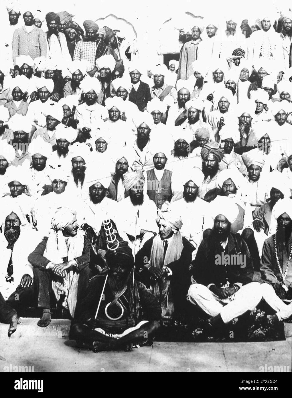 Dakhni Sikhs, including Akali Hazura Singh, posing with two British ...