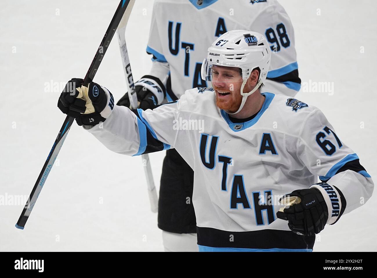 Utah Hockey Club left wing Lawson Crouse celebrates after an NHL hockey ...