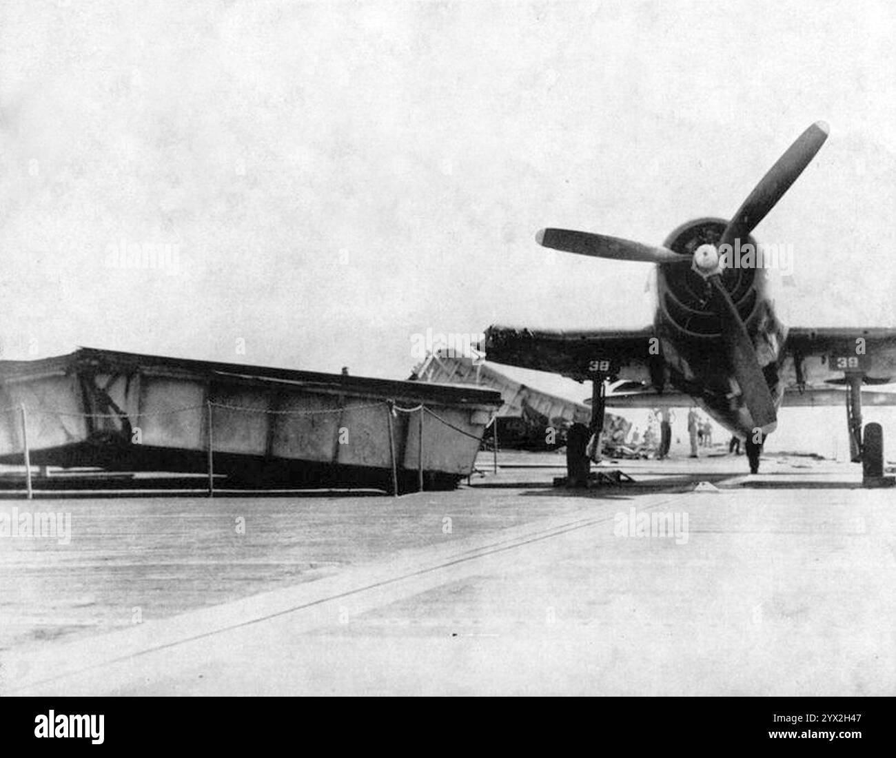 Damaged Grumman F6F-5 Hellcat of VC-33 aboard USS Sangamon (CVE-26), in ...