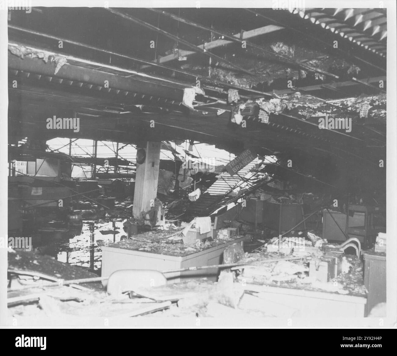 Damage to Office Area with a hole in the roof and the tilted column at ...