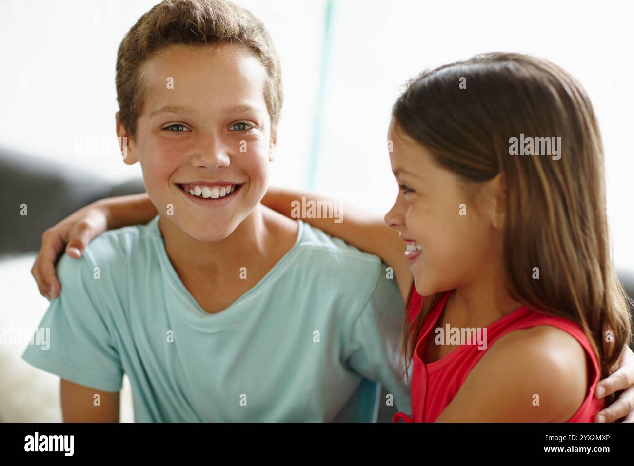 Children, portrait and siblings embrace in home, support and security ...