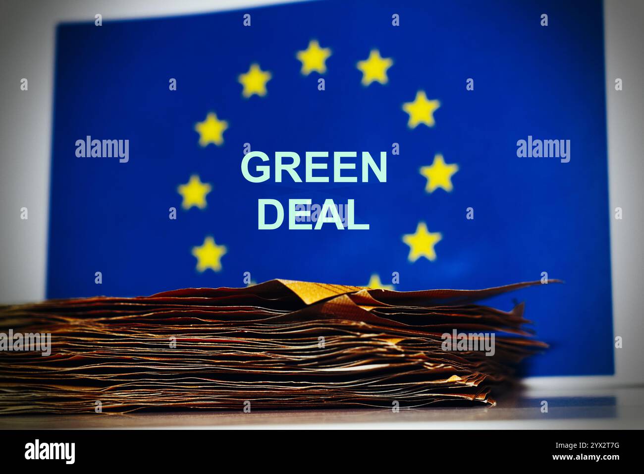 Stack of banknotes with the background of the Flag of European union ...