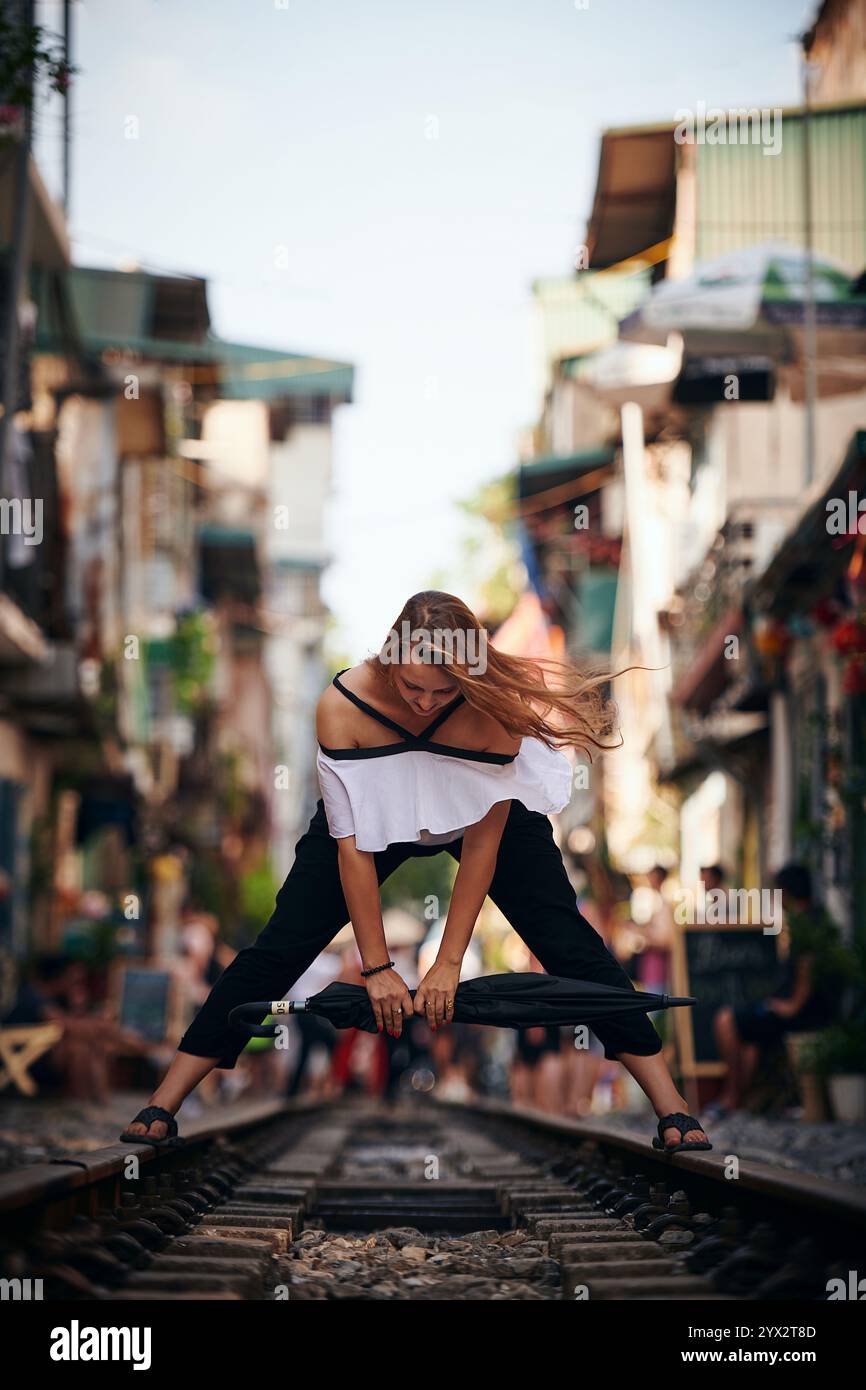 Funny girl dancing on street hi-res stock photography and images - Alamy