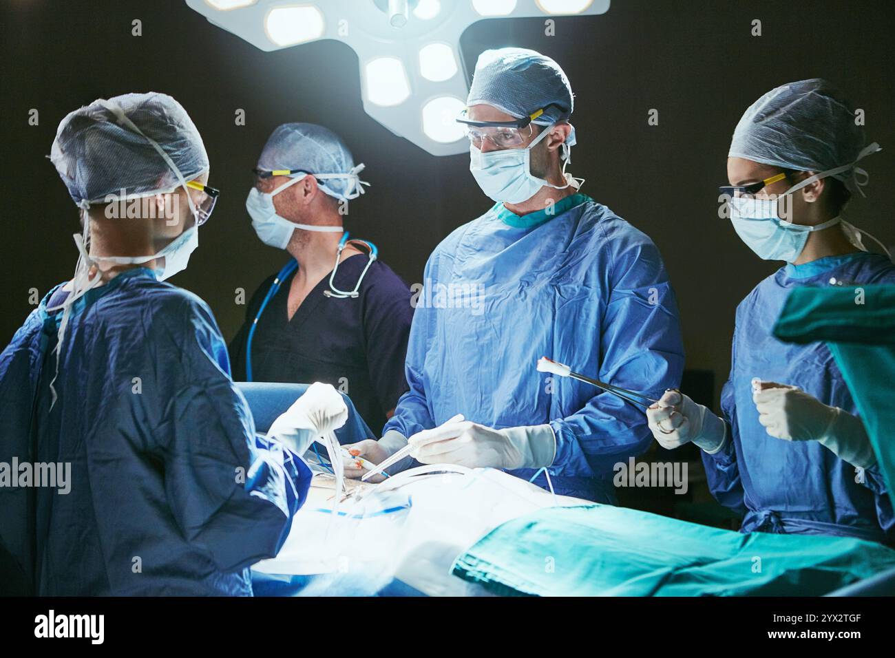 Doctors, nurses and person for surgery, teamwork and support for ...