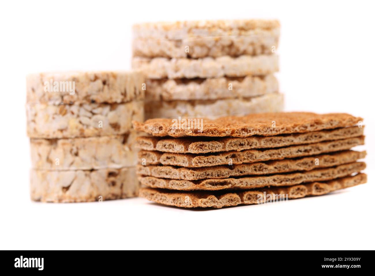Composition of corn cracker and bread crisps. White background Stock ...