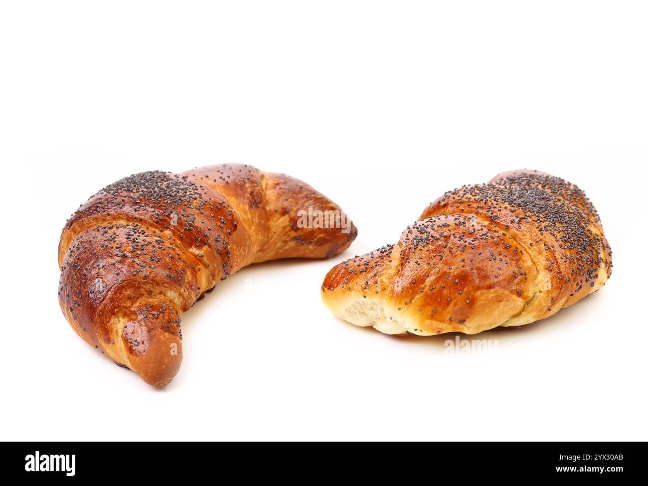 Appetizing croissants with poppy on a white background Stock Photo - Alamy