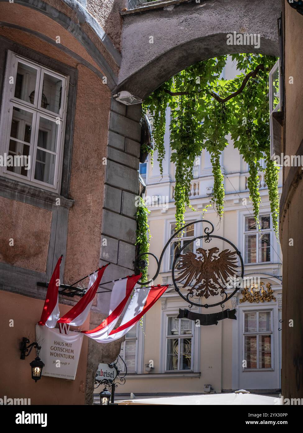 Historic Austrian Building with Ornate Ironwork and Austrian Flag in ...