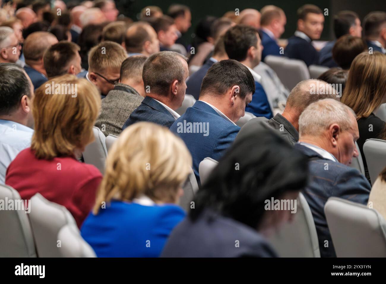 Diverse audience seated in formal hi-res stock photography and images ...