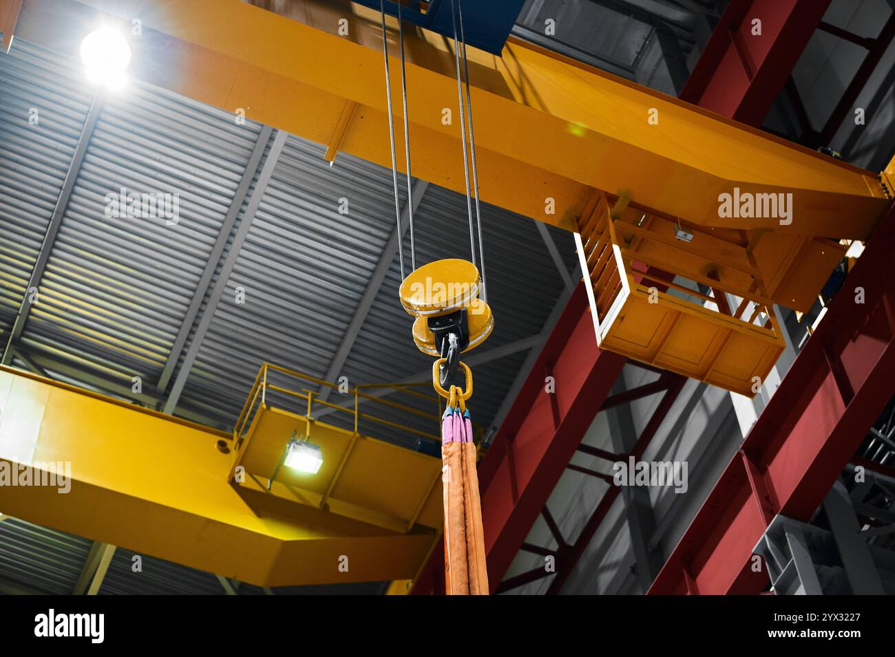 Hook assembly with rigging and strops of moving crane Stock Photo - Alamy