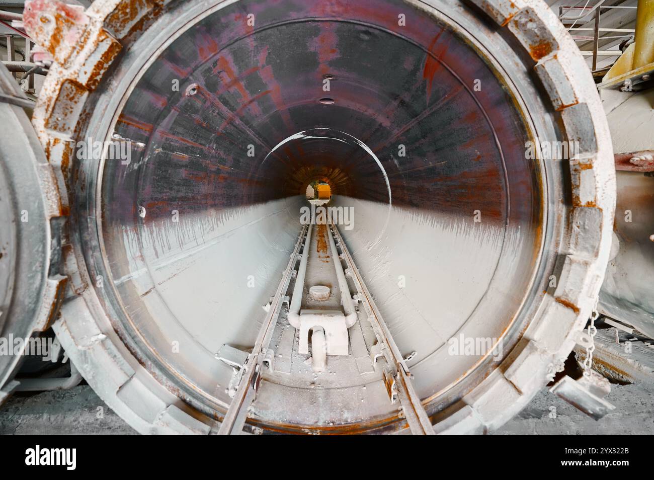 Open empty digestion tanks hardening in plant workshop Stock Photo - Alamy
