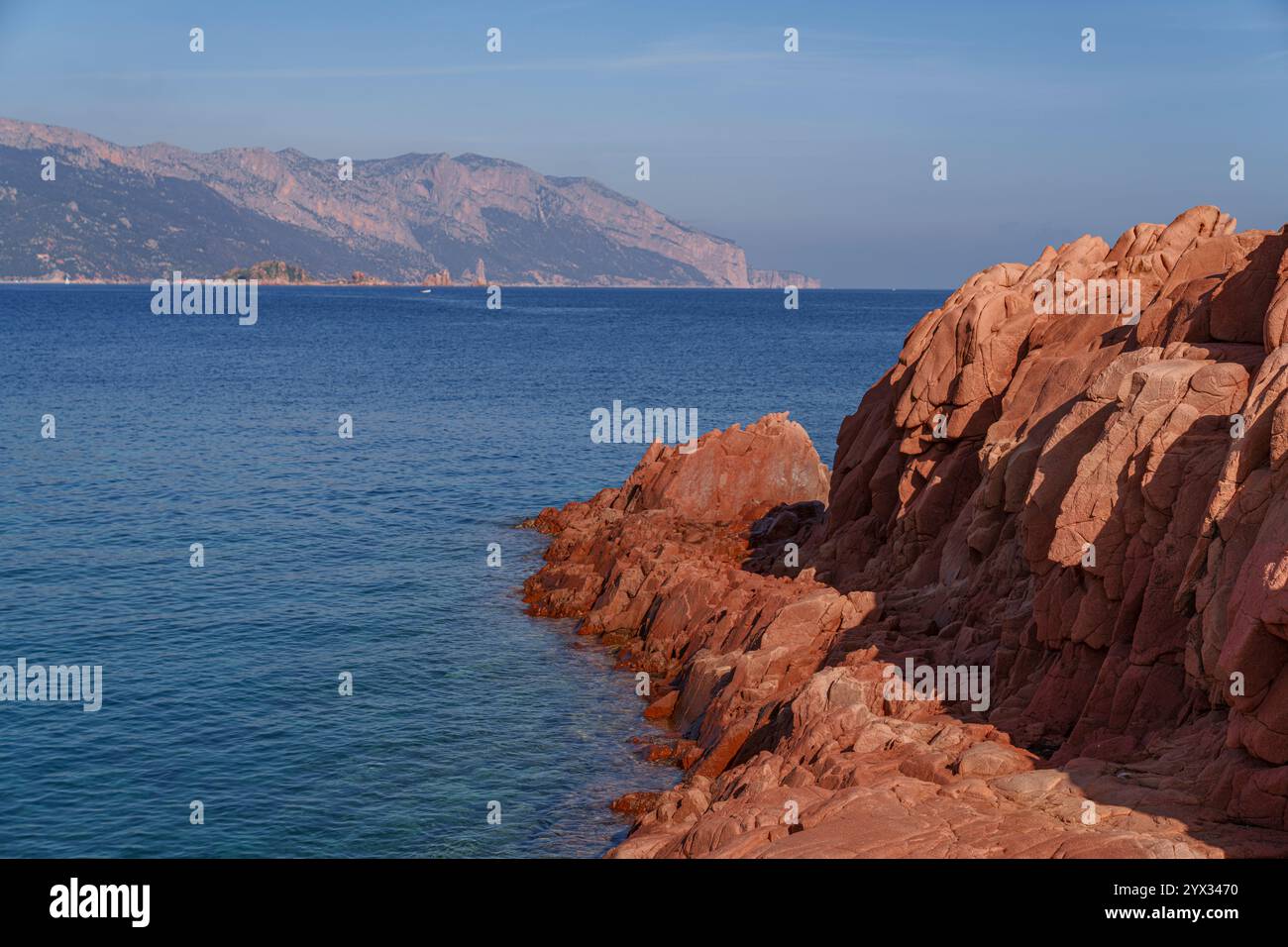 Rocky seaside with beautiful water color and amazing rock colors Stock ...
