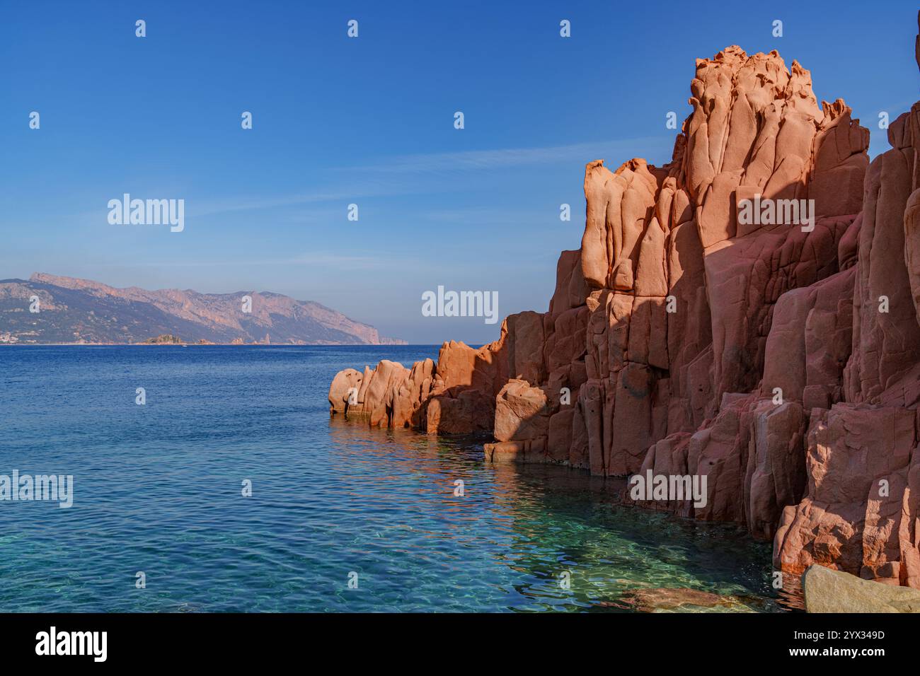 Rocky seaside with beautiful water color and amazing rock colors Stock ...