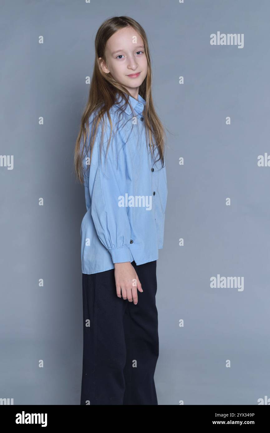 Child in a confident half-turn posture. Ideal for conveying self-esteem ...