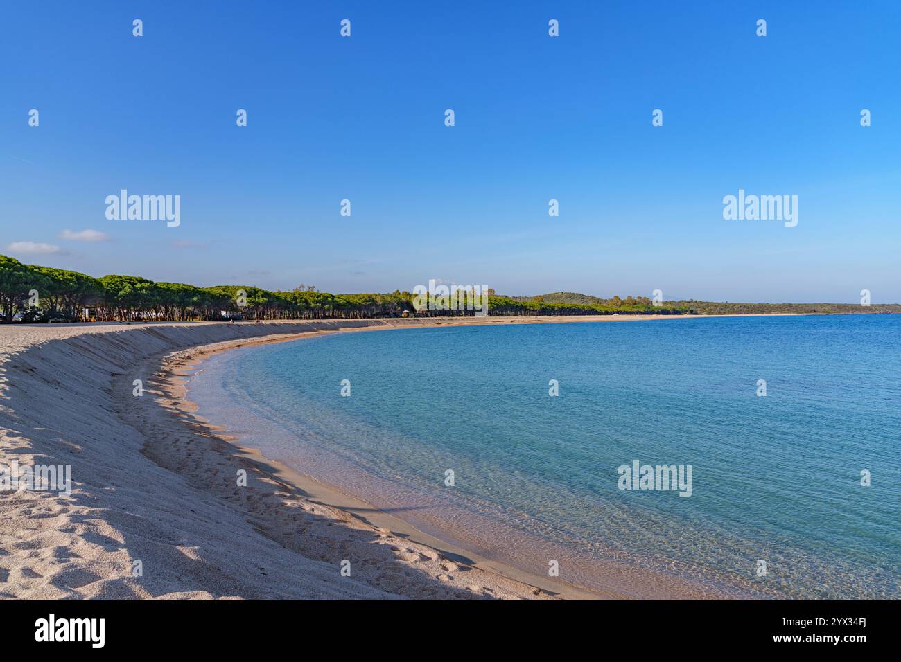 The beautiful color of the Sardinian sea right on the shore with a view ...