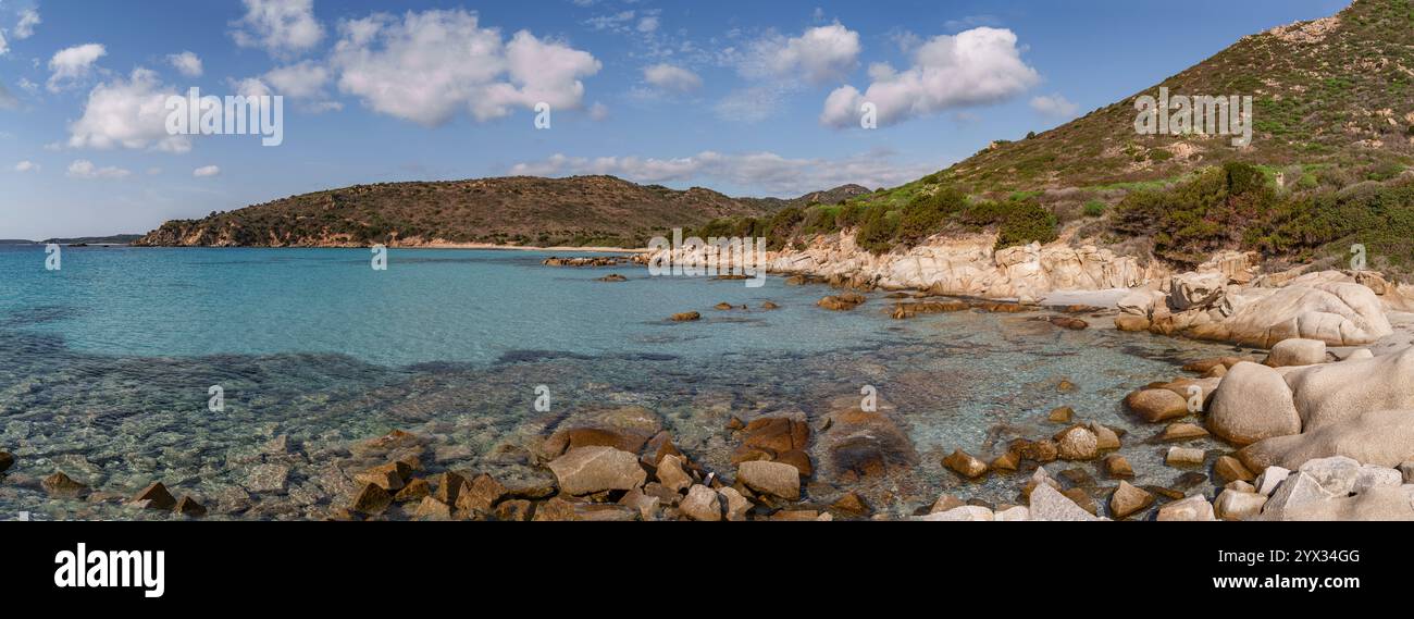 The beautiful color of the Sardinian sea right on the shore with a view ...