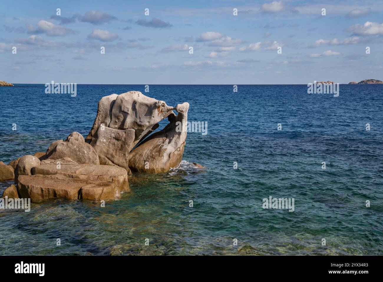 Rocky seaside with beautiful water color and amazing rock colors Stock ...
