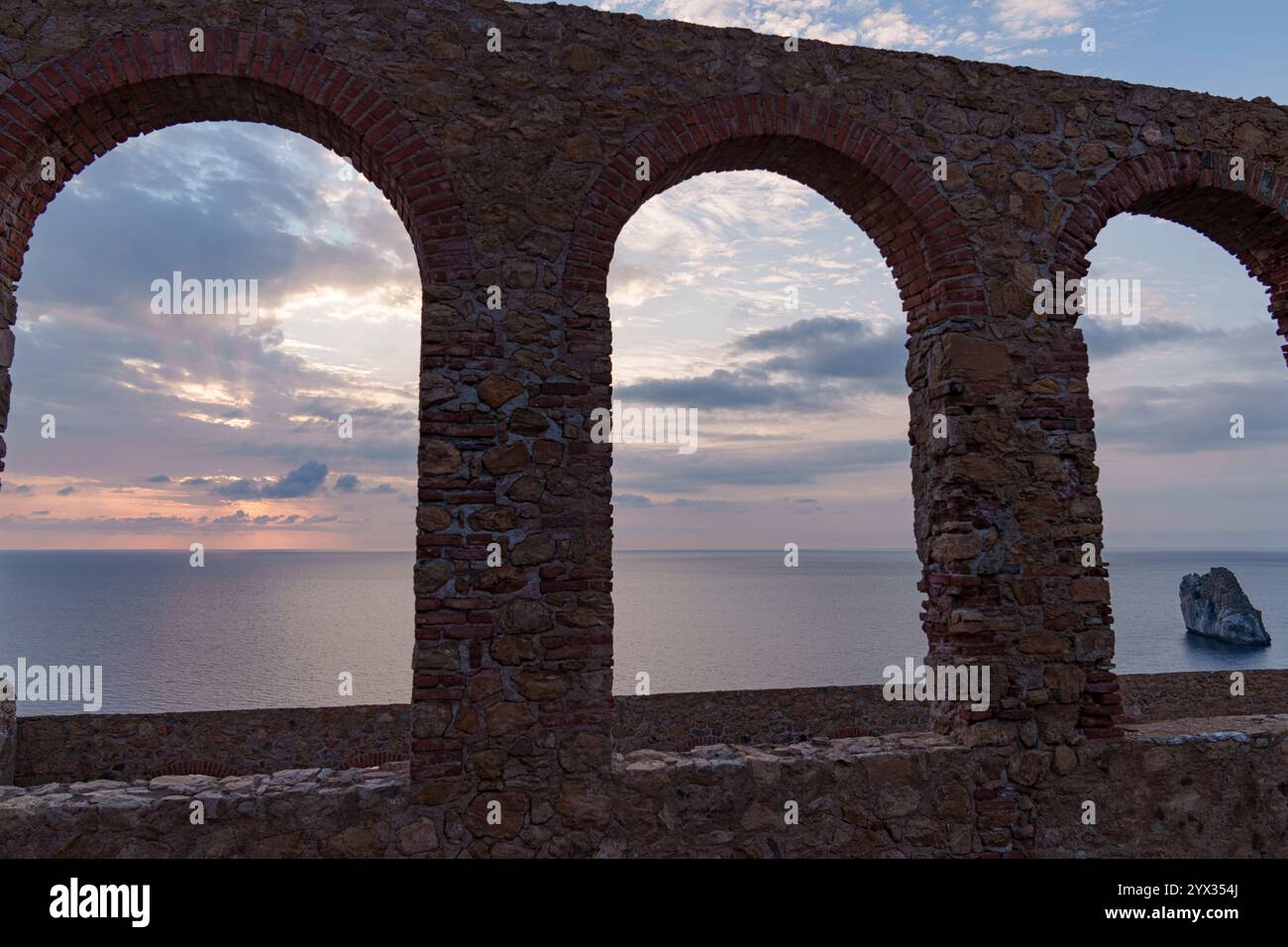 View through old brick windows to the sea at sunset Stock Photo - Alamy