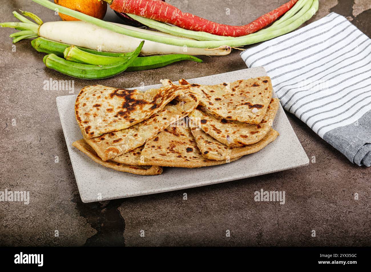 Indian vegetarian Aloo Paratha - bread with potato Stock Photo - Alamy