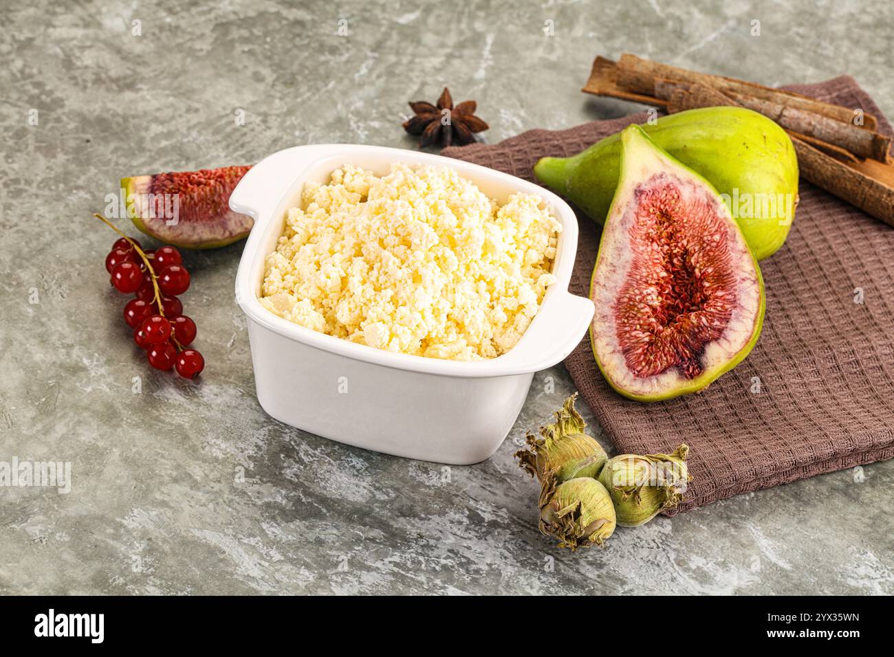 Delicous sheep cottage cheese curd served fig Stock Photo - Alamy
