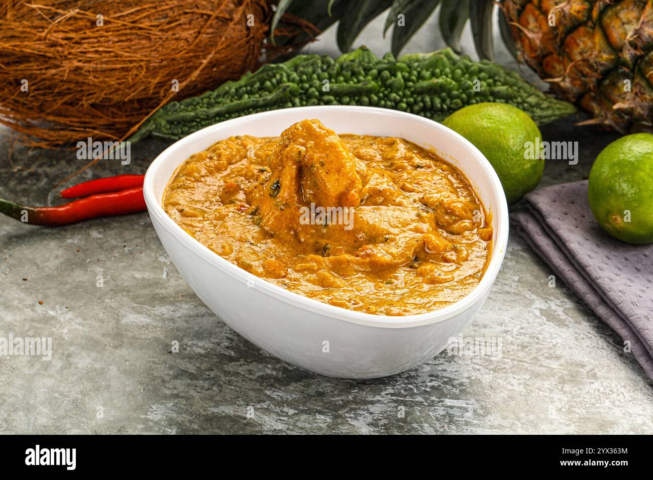 Indian cuisne - Chicken massala with sauce and spices Stock Photo - Alamy