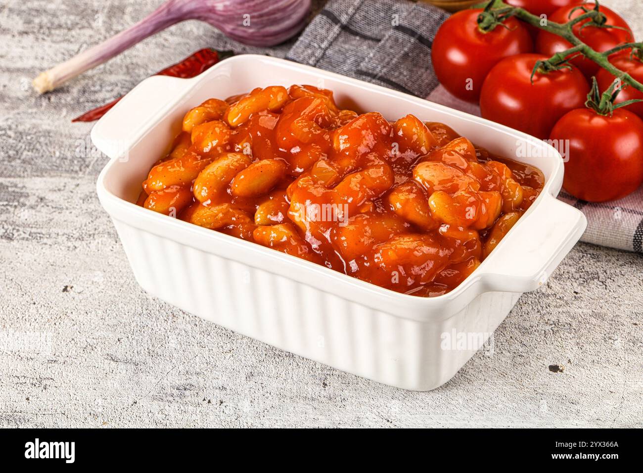 Baked white kidney bean with tomato sauce Stock Photo - Alamy