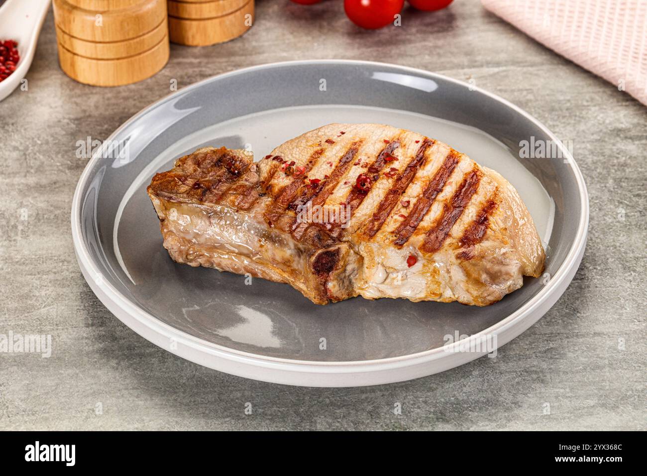 Grilled fat pork loin steak with bone Stock Photo - Alamy
